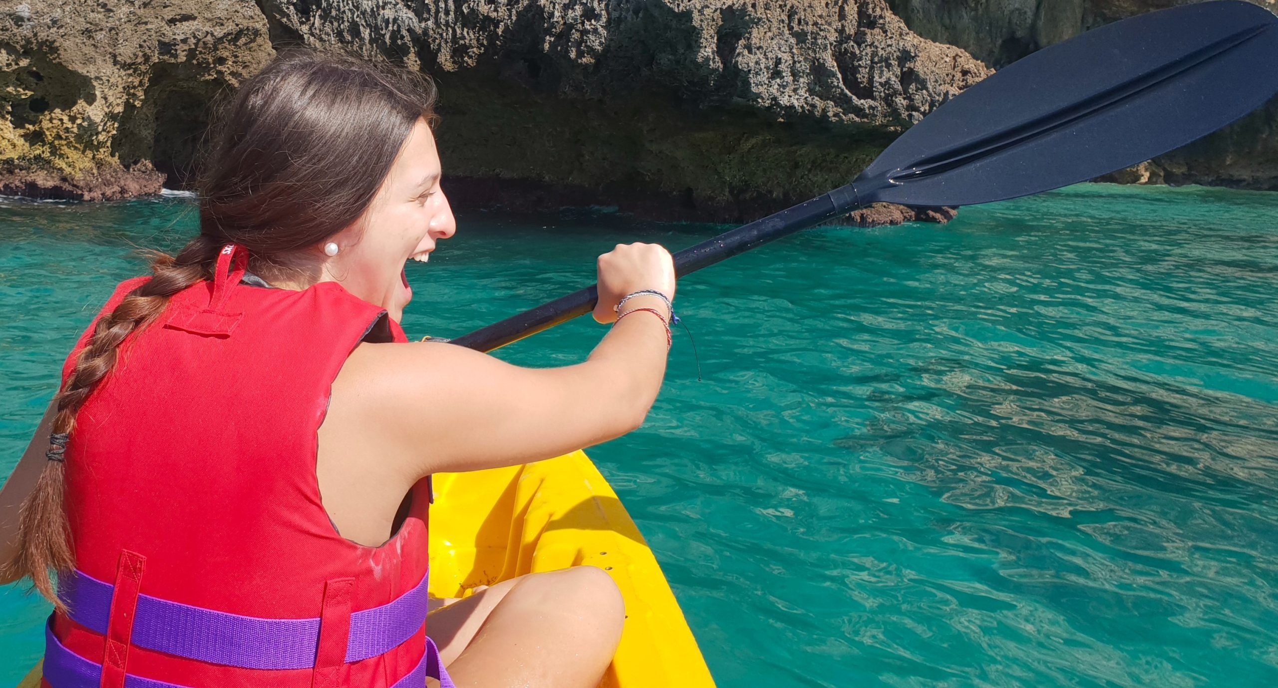 Sea kayaking in Nerja with the waterfall and cliffs of Maro